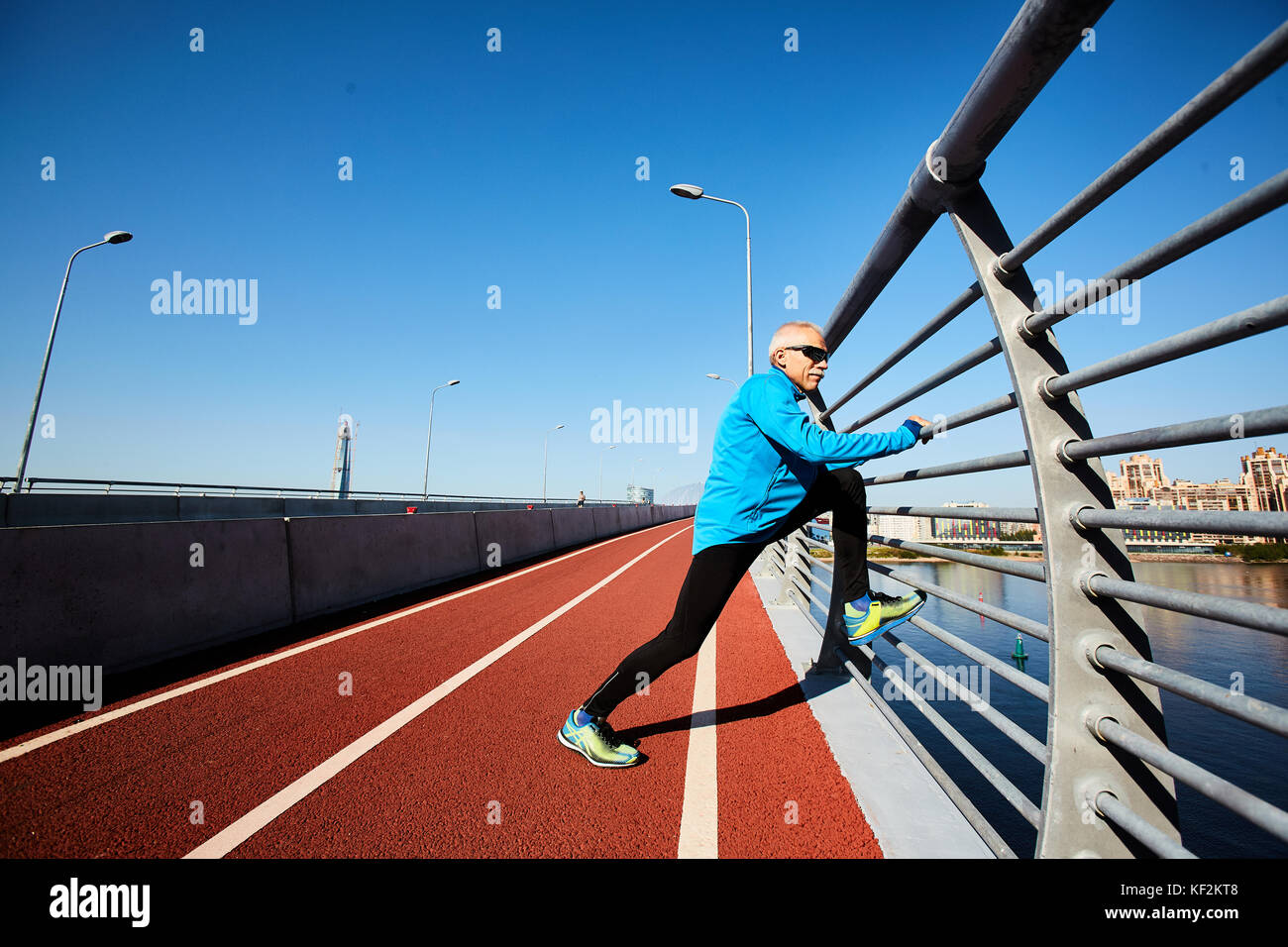 Doing Stretching Exercise Stock Photo - Alamy