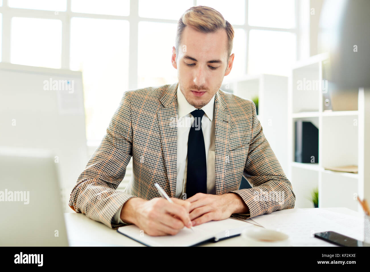 Notes in working diary Stock Photo - Alamy