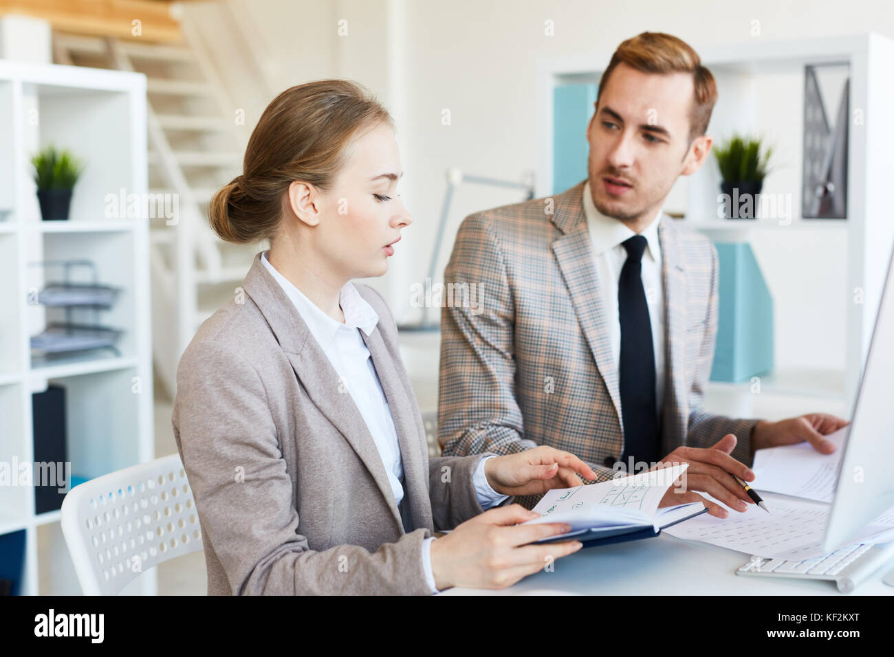 Managers at work Stock Photo - Alamy