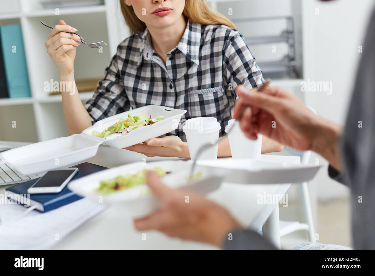 Eating lunch from containers Stock Photo - Alamy