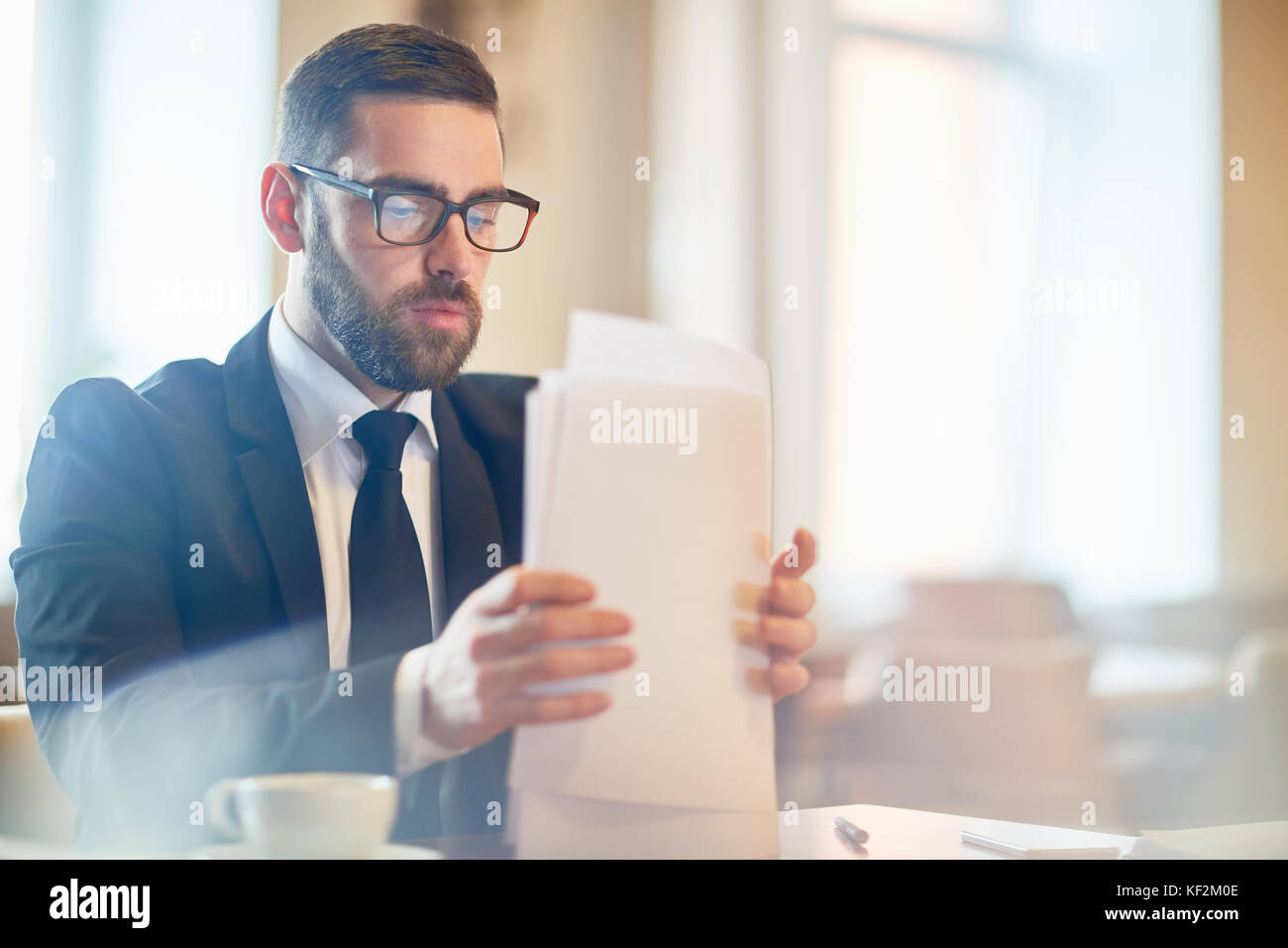 Wrapped up in Paperwork Stock Photo - Alamy