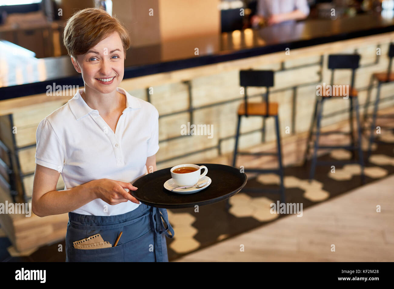 Pretty Waitress at Work Stock Photo - Alamy