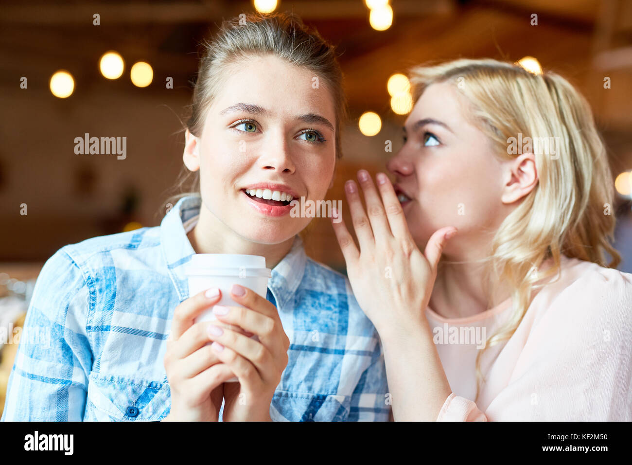 Sharing Secret with Best Friend Stock Photo - Alamy