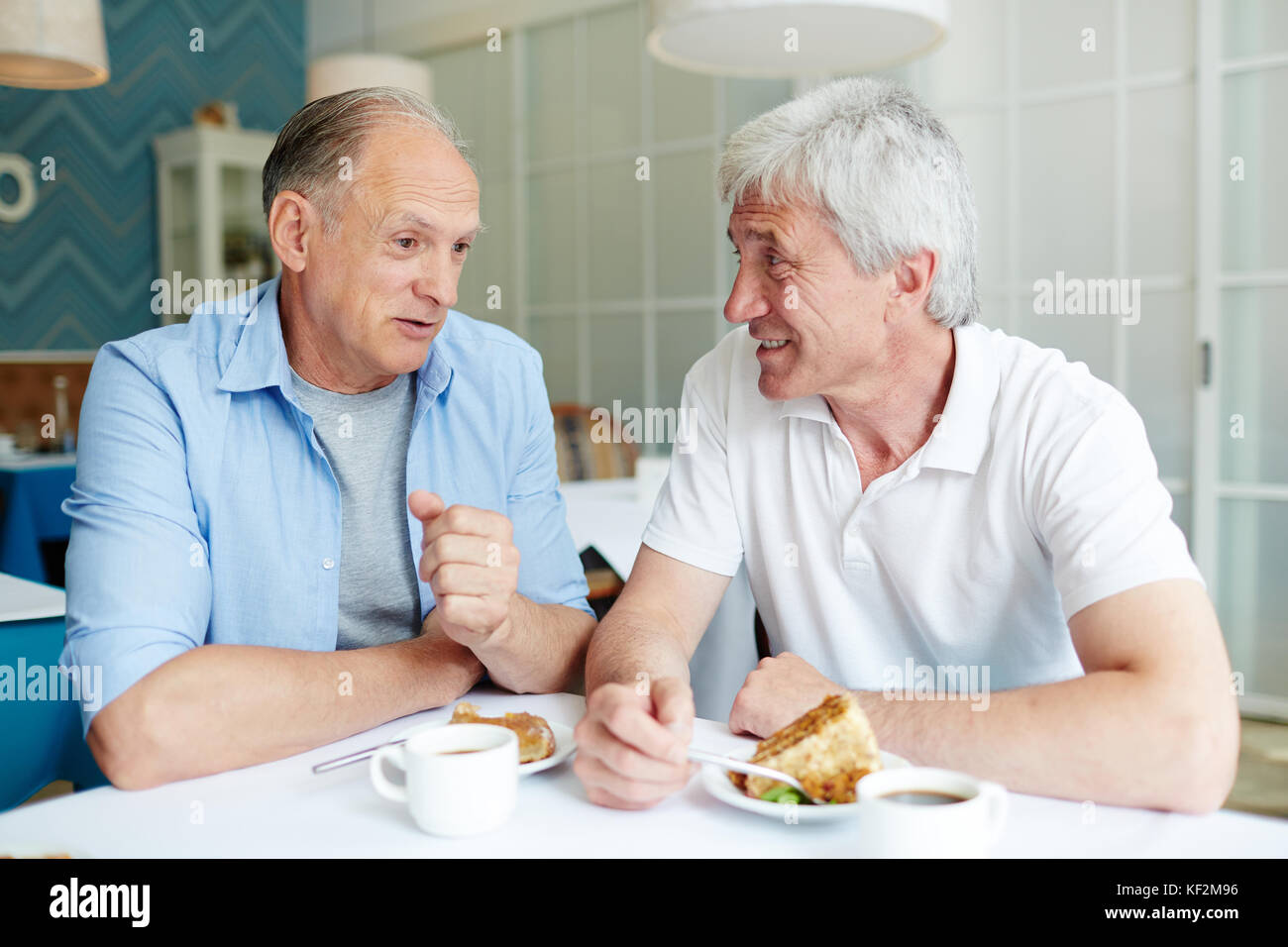 Talk of men Stock Photo - Alamy