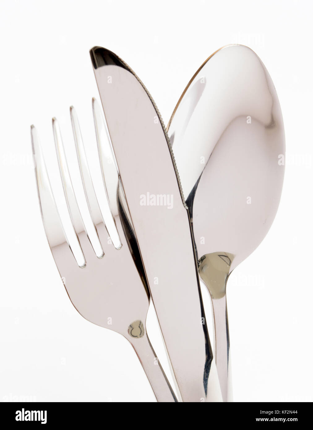 Cutlery. Closeup on white background Stock Photo - Alamy