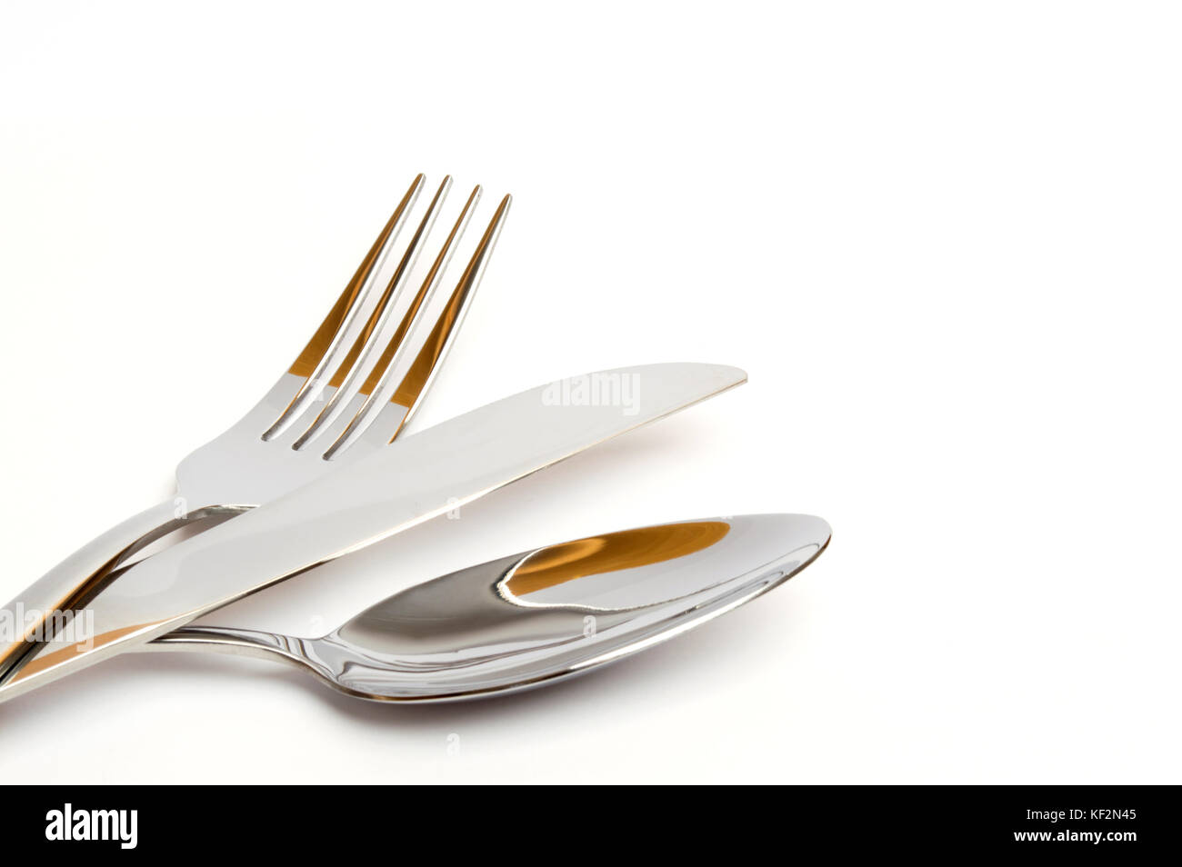 Cutlery. Closeup on white background Stock Photo - Alamy