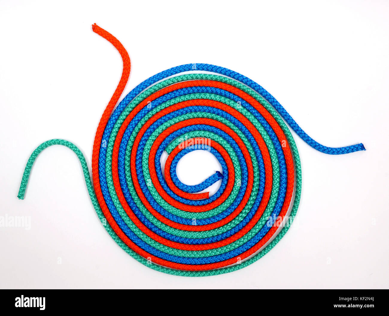 ropes rolled up on white background Stock Photo - Alamy