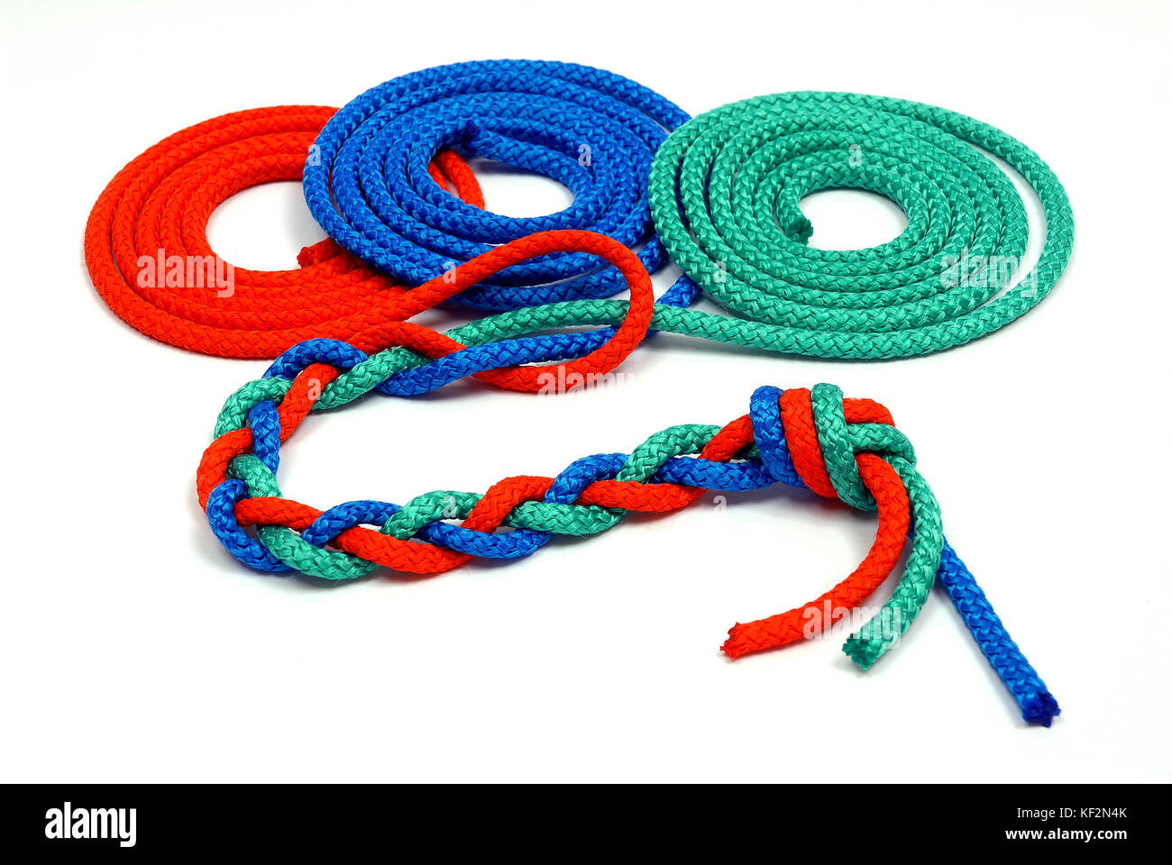 ropes rolled up on white background Stock Photo - Alamy