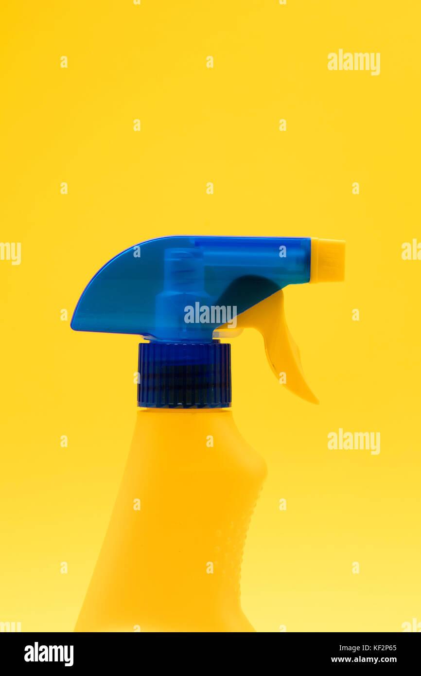 Cleaning spray bottle products on a bright yellow background Stock ...