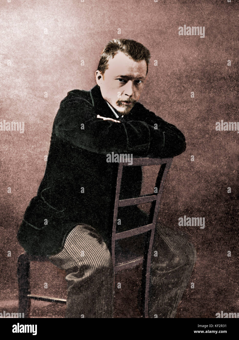 Hugo Wolf sitting on chair. Austrian composer 13 March 1860-22 February ...