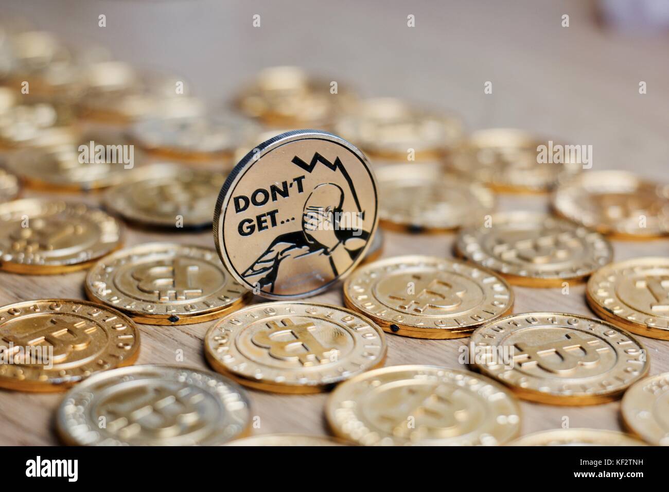 Digital currency physical metal bitcoin coin on the gold money ...