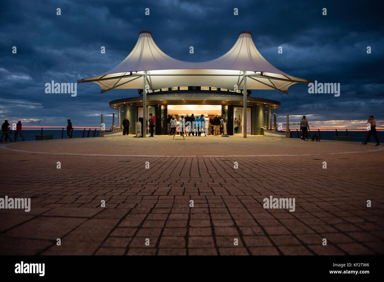 The seaside promenade and bandstand at night, summer evening ...