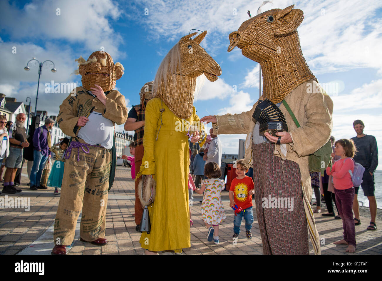 Performers from The Armagh Rhymers wearing their traditional wicker ...
