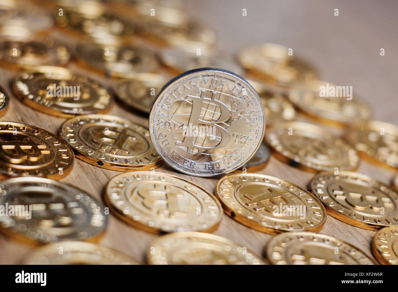 Digital currency physical metal bitcoin coin on the gold money ...