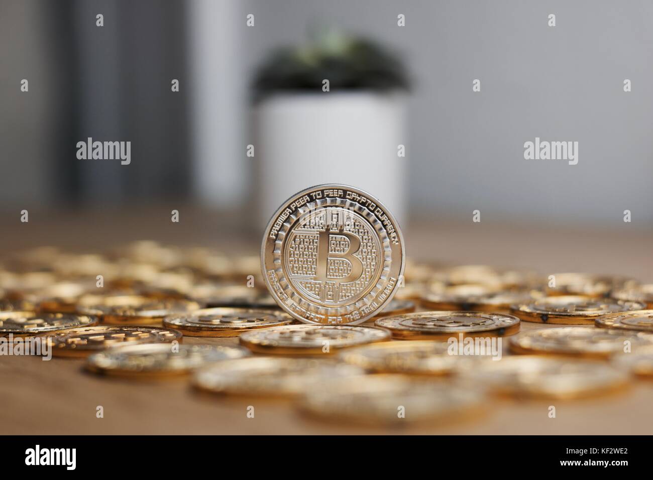 Digital currency physical metal bitcoin coin on the gold money ...