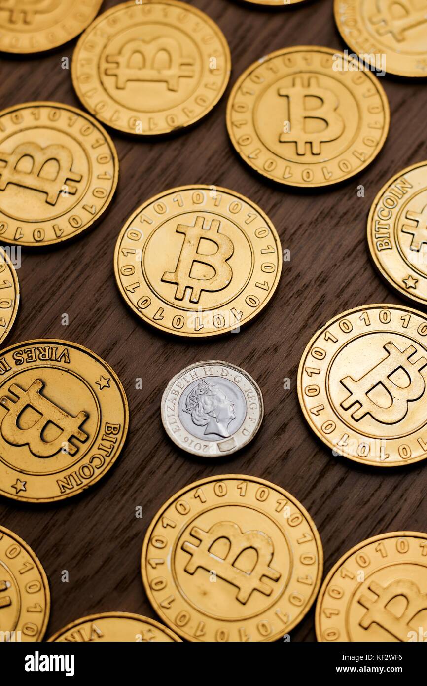 Digital currency physical metal bitcoin coin on the gold money ...