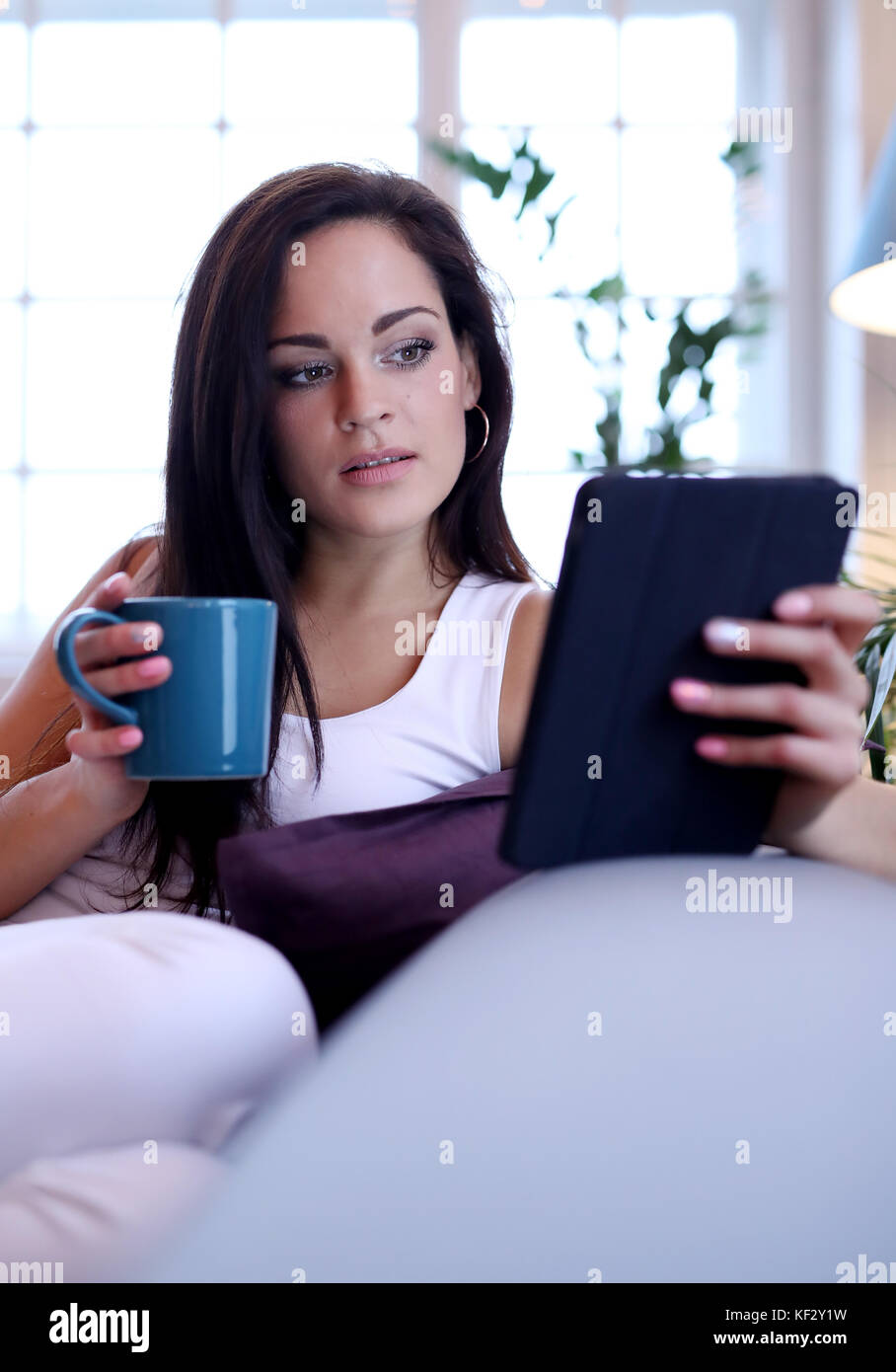 Lifestyle. Beautiful woman at home Stock Photo - Alamy
