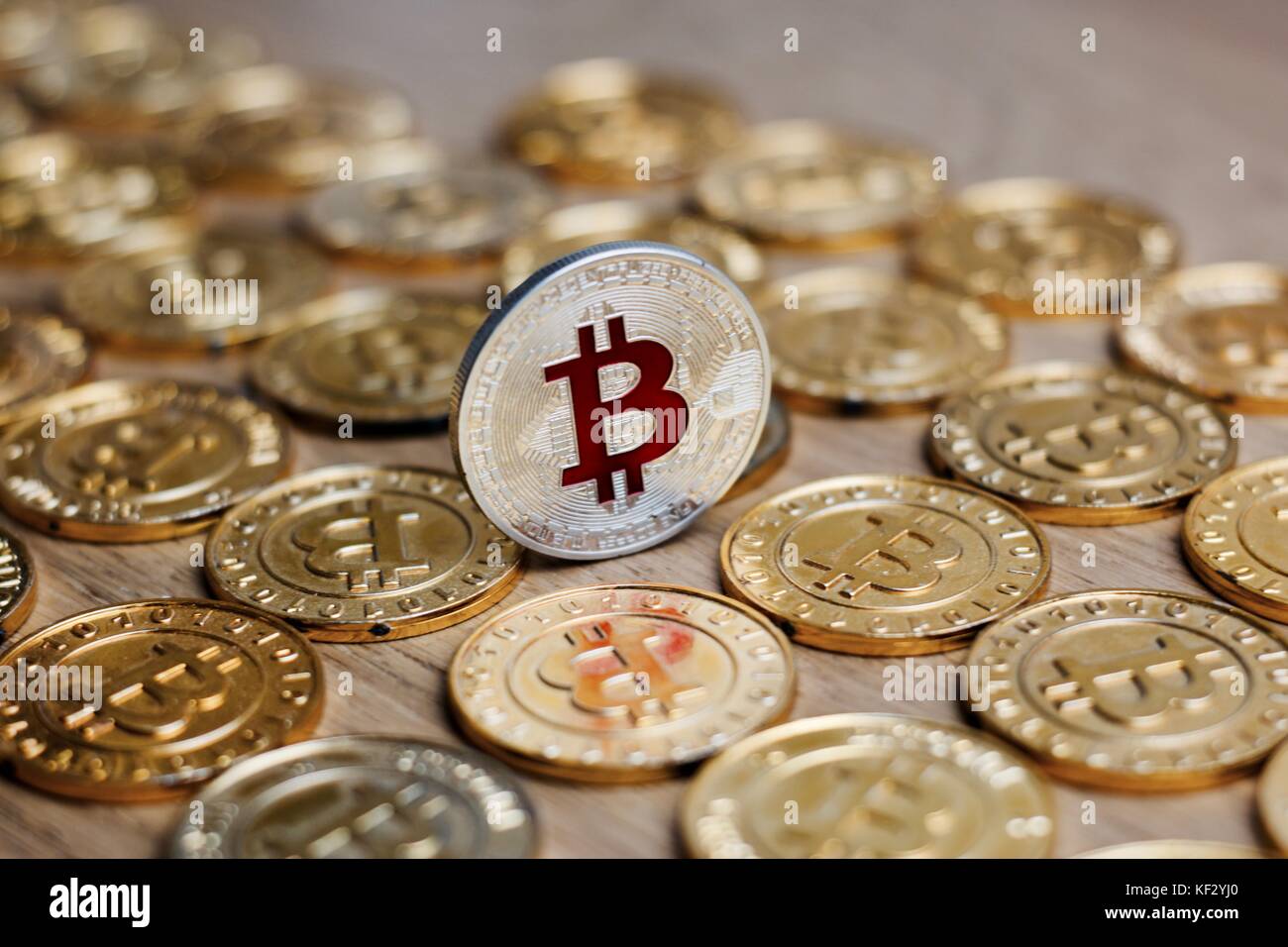 Digital currency physical metal bitcoin coin on the gold money ...