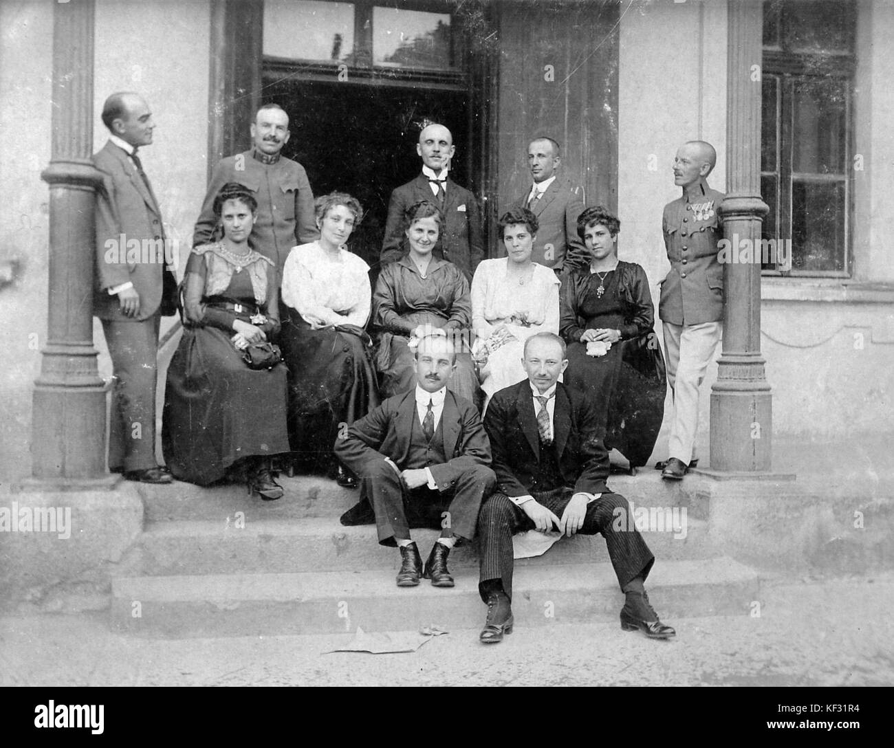 Tableau, men, women, uniform, yard, porch, stairs 2277 Stock Photo - Alamy