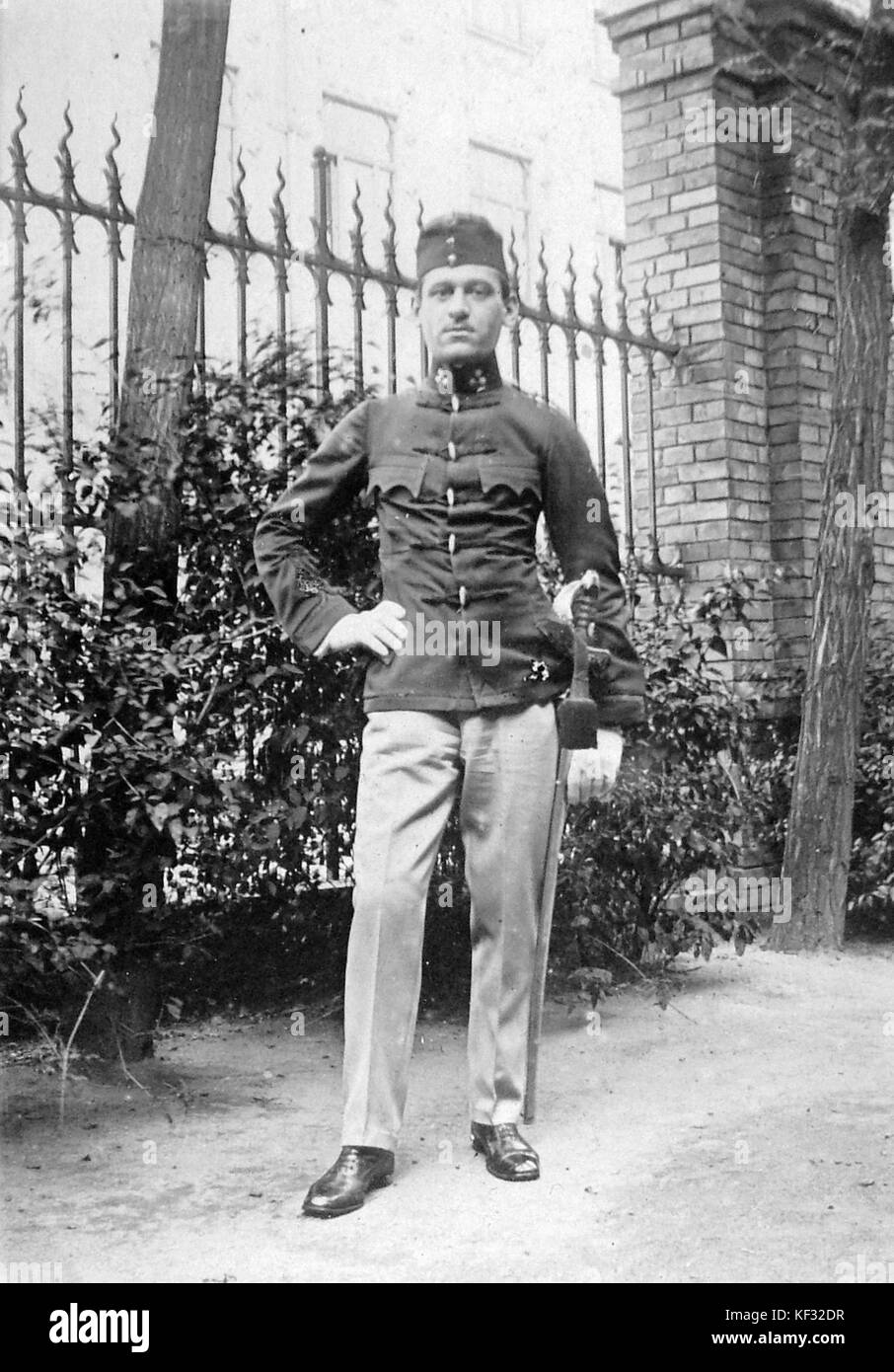 This portrait depicts a man in uniform, holding a sword, possibly from ...