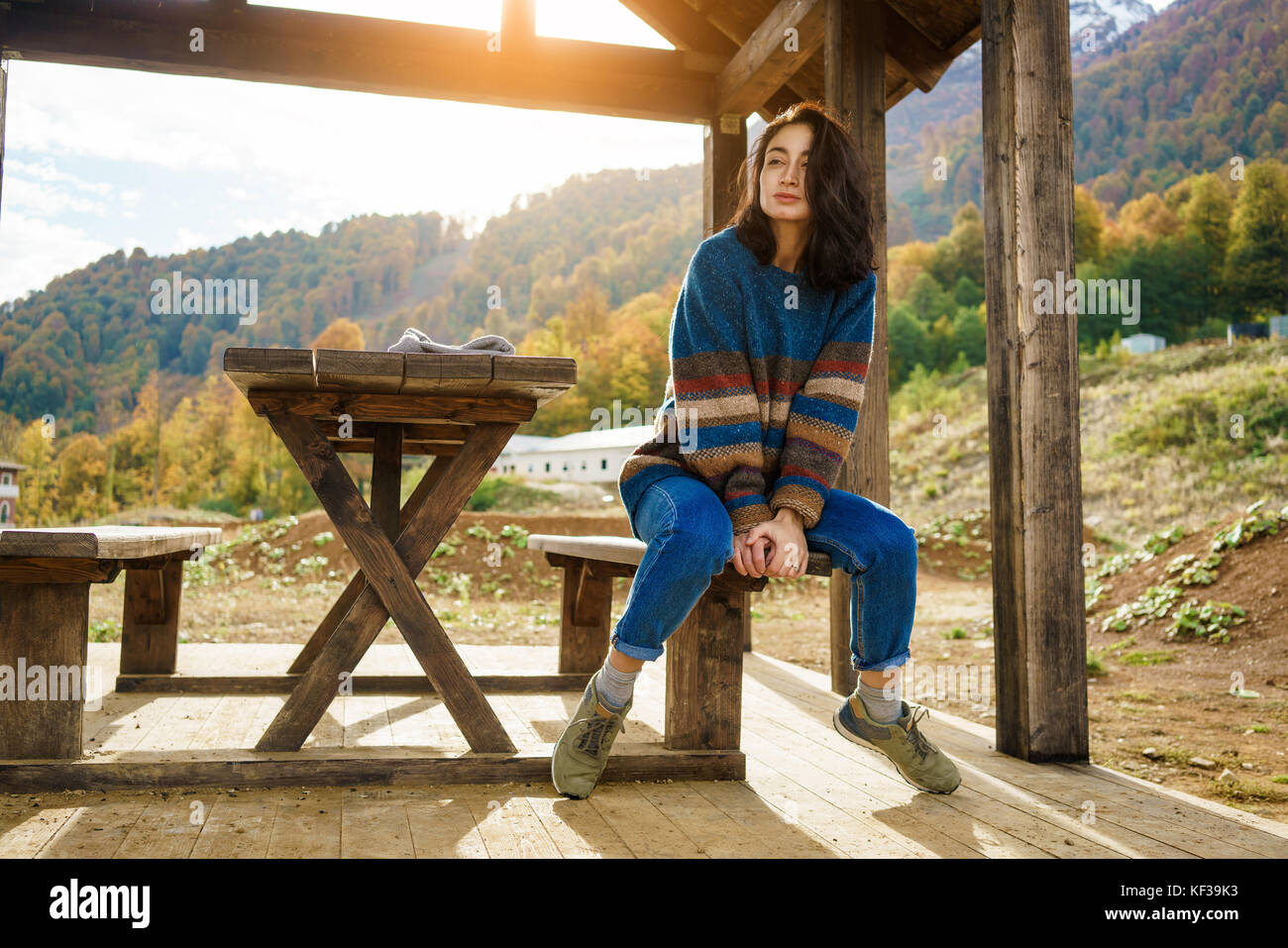 Girl travel in mountains alone. Spring weather, calm scene. Backpacker ...