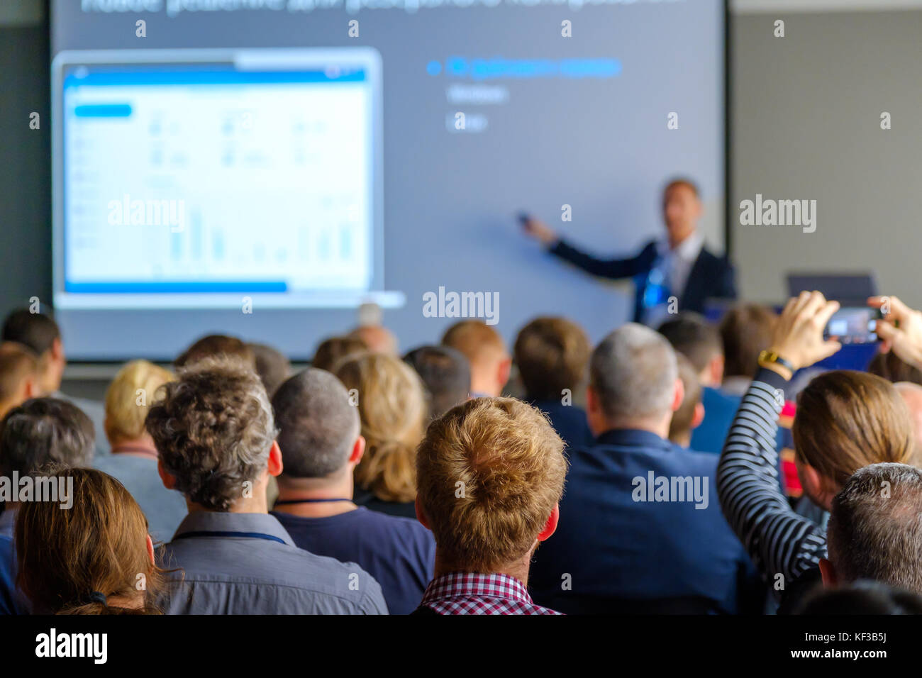 Audience listens to the lecturer Stock Photo - Alamy