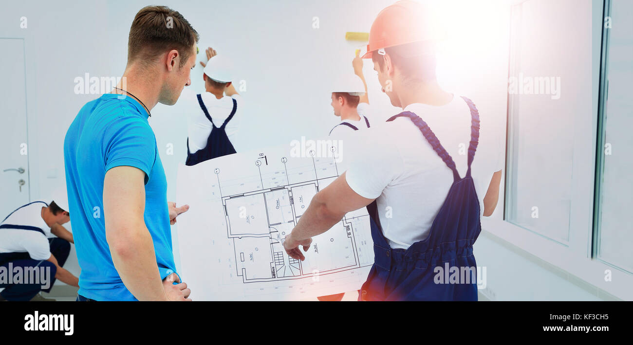 Architect and client discussing the plan of the building Stock Photo ...