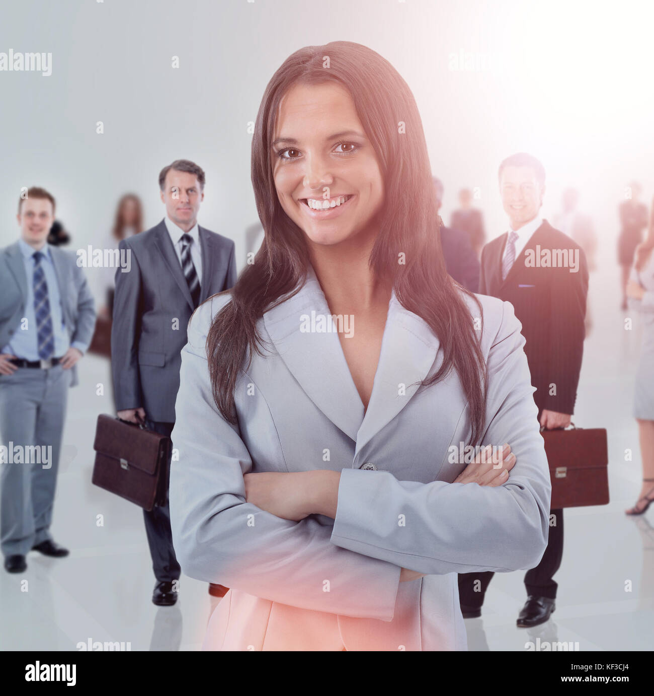 Leader and her team, Young attractive business people Stock Photo - Alamy