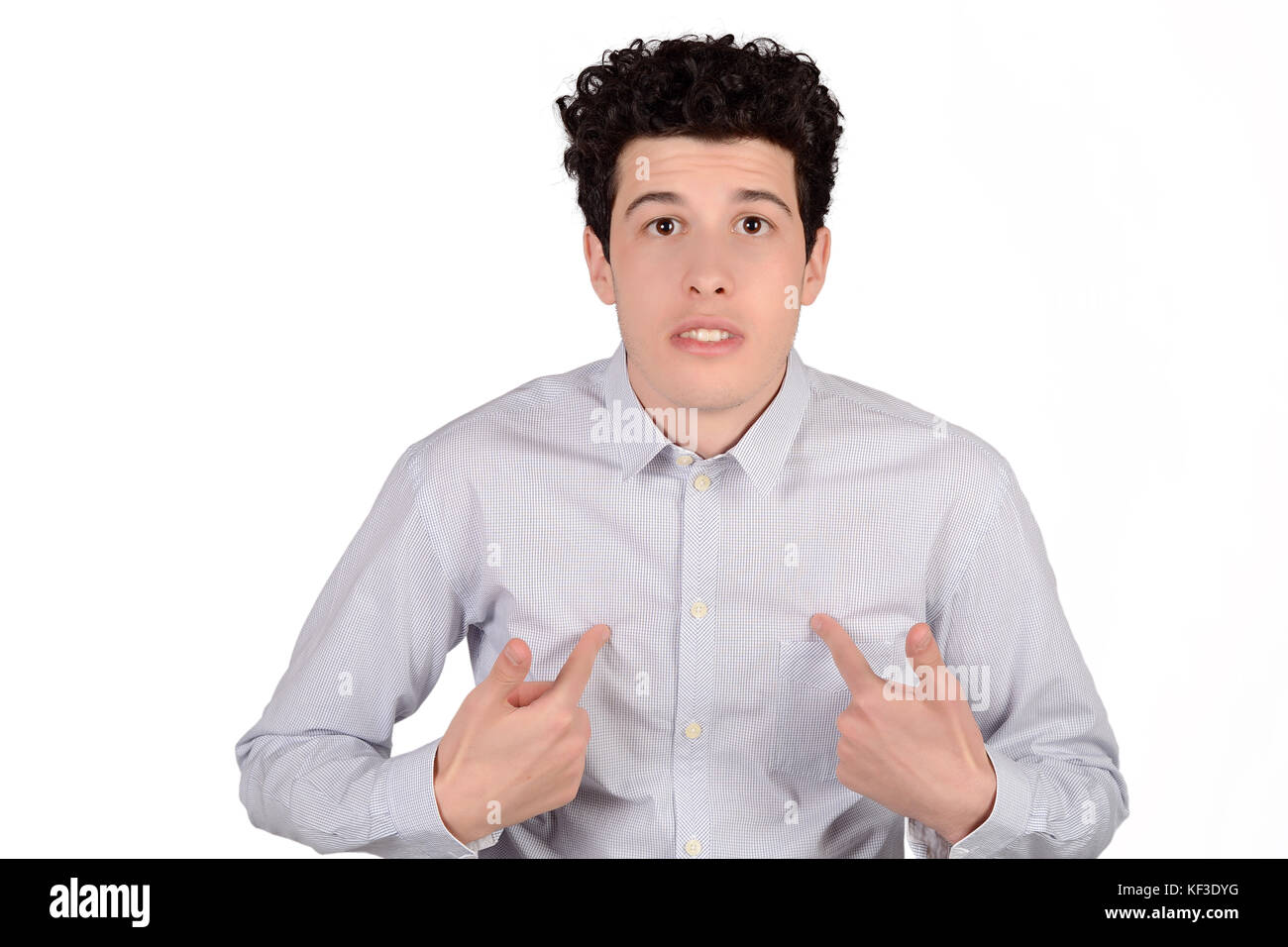 Portrait of young man pointing himself. Isolated white background Stock ...