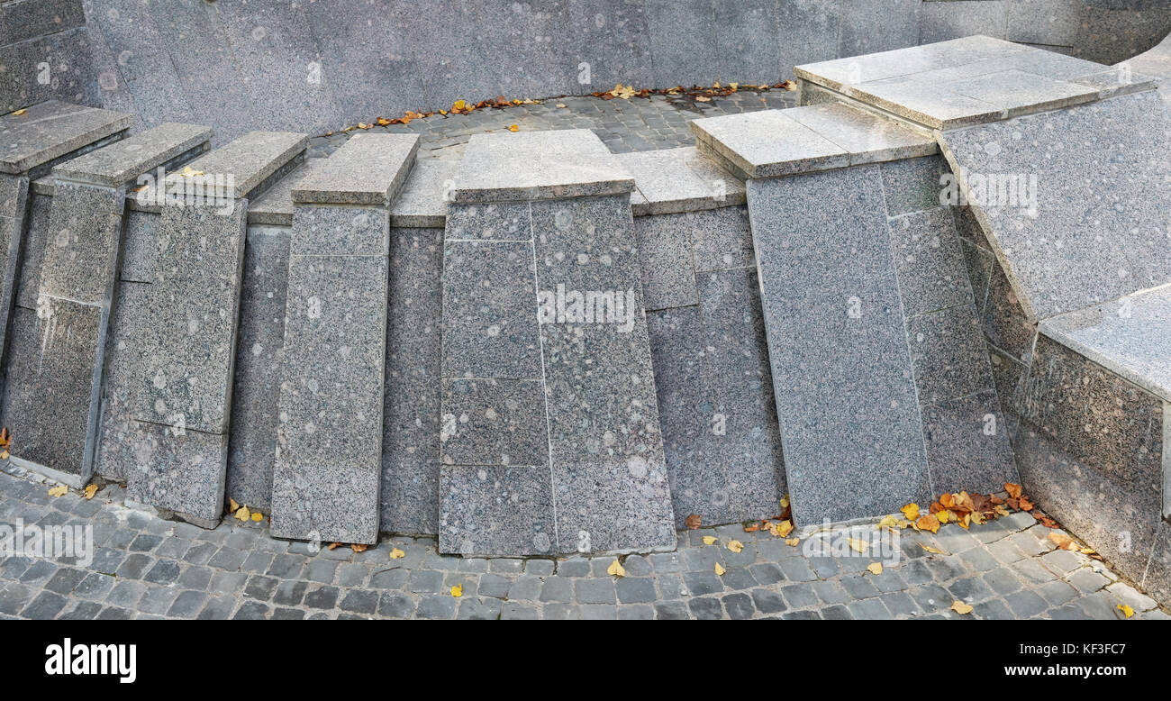 The dry interior space of the disconnected city fountain is adorned ...