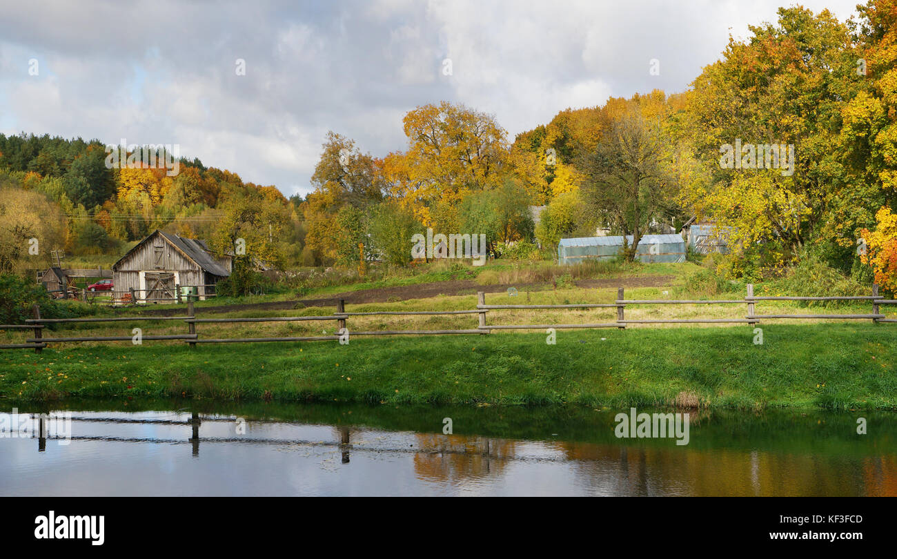 A typical rustic Lithuanian autumn landscape. In the frame is all ...