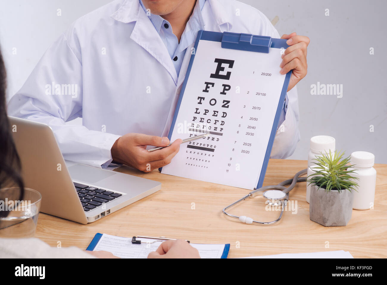 Asian doctor eye test chart hi-res stock photography and images - Alamy