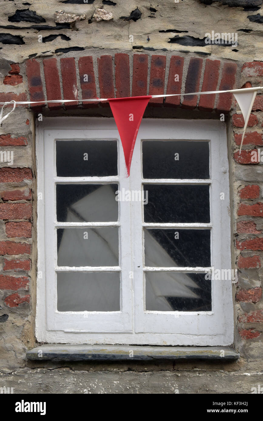 A model yacht in the window of a cornish coastal cottage or holiday ...