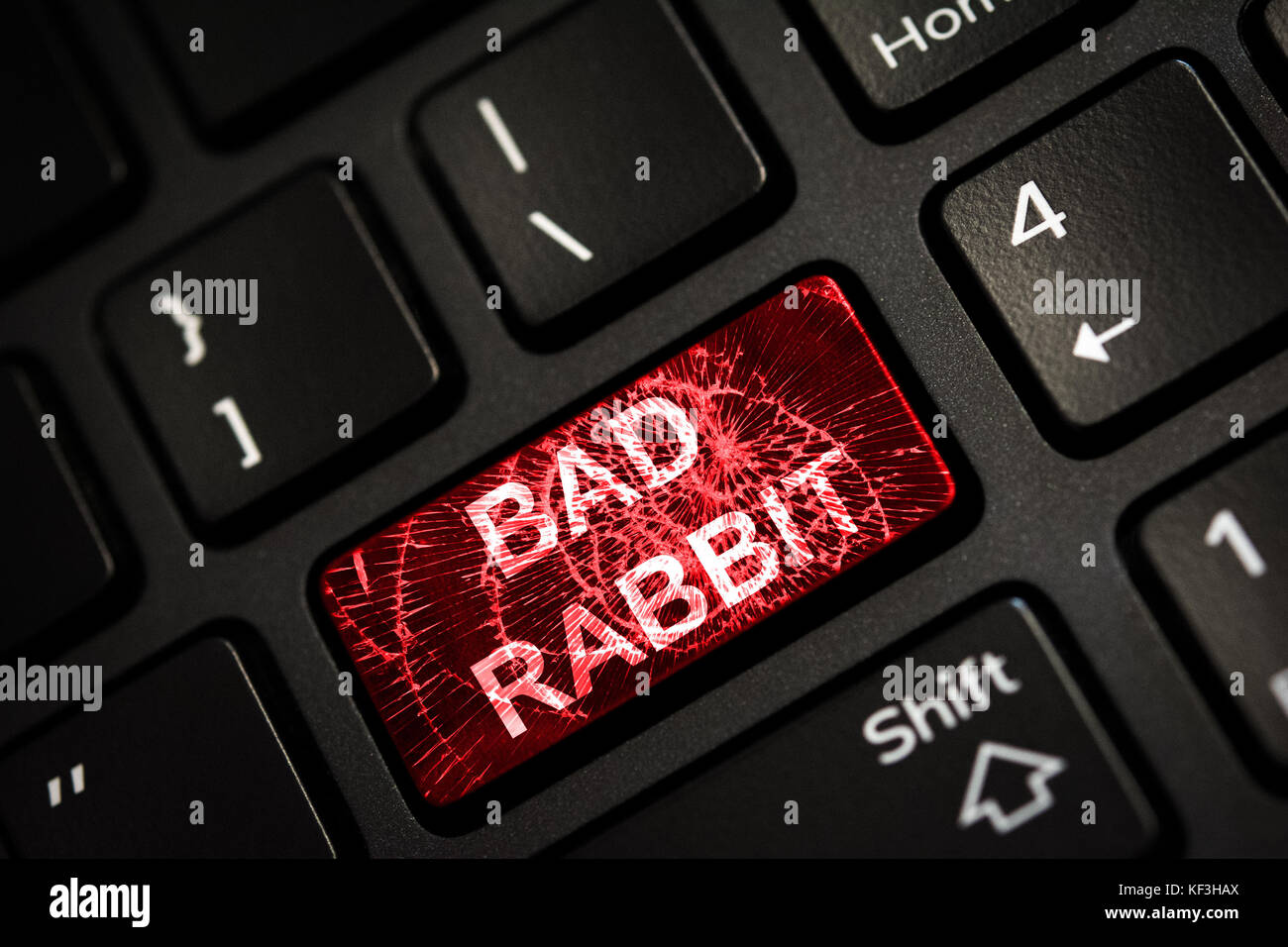 Message on broken red enter key of keyboard. Computer Bad Rabbit virus ...