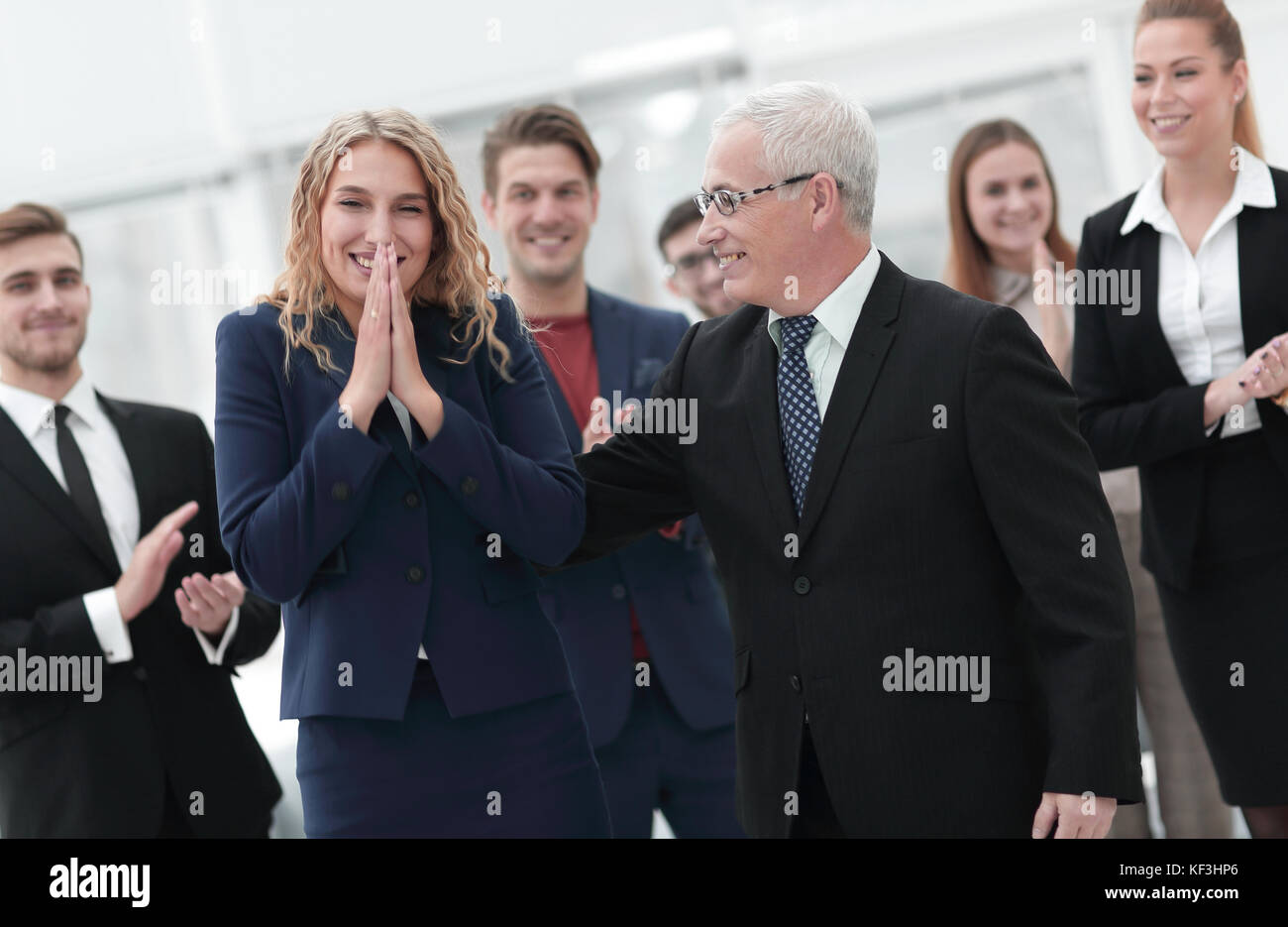 happy business woman and senior business partner on the business ...