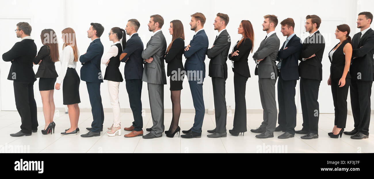 large business team standing one behind the other Stock Photo - Alamy