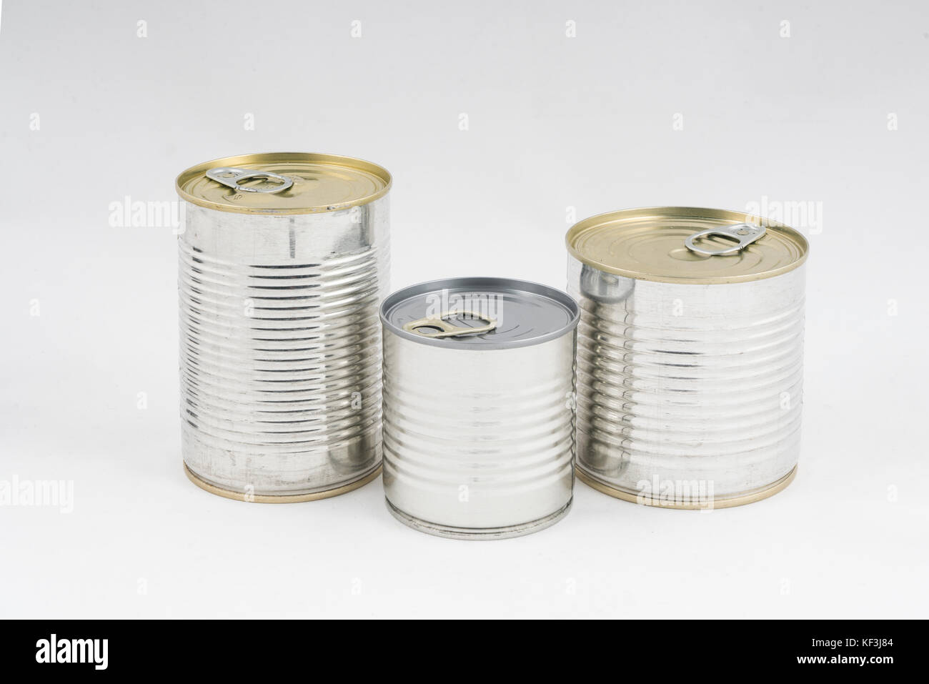 metal cans on the table Stock Photo - Alamy