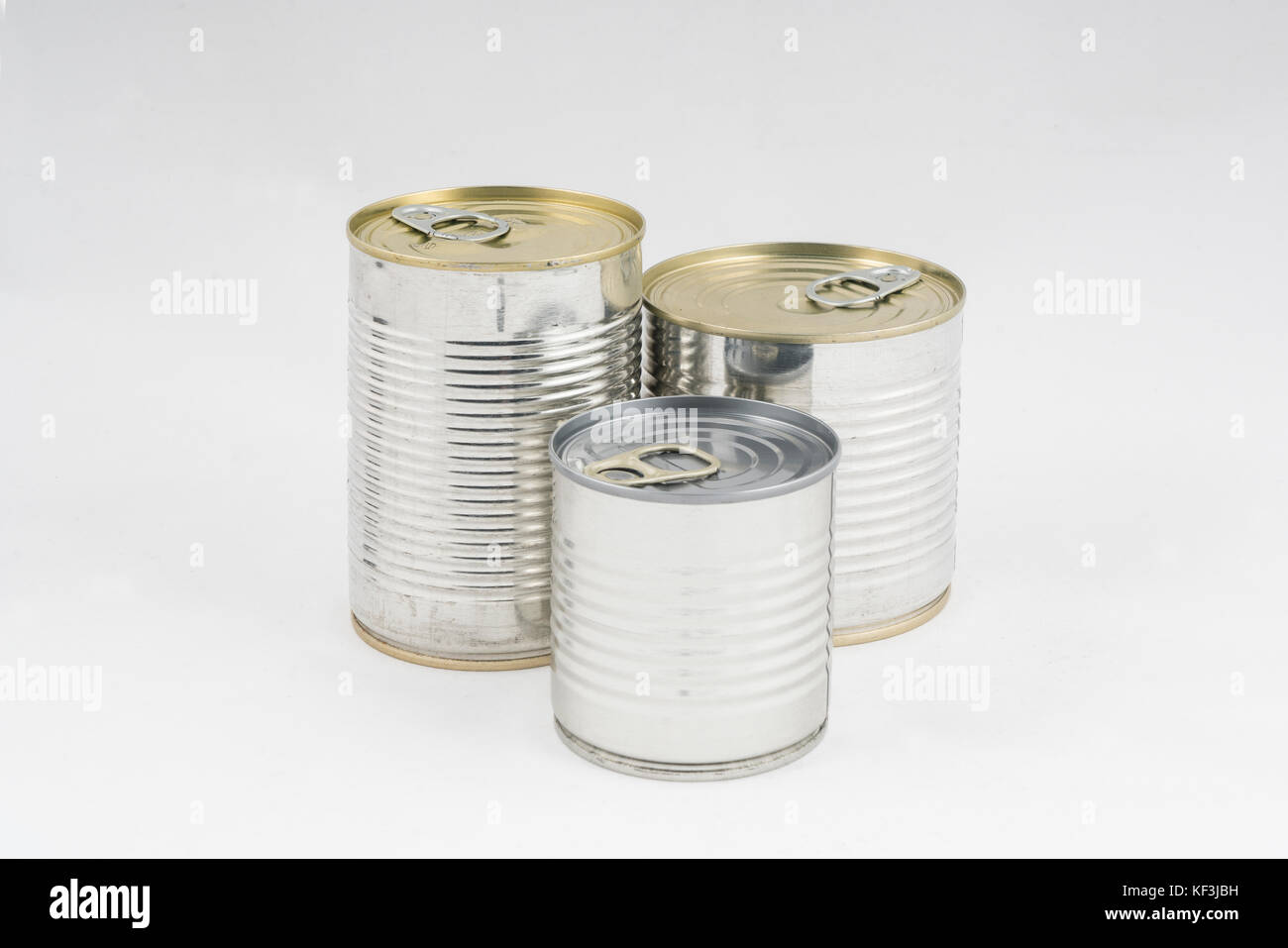 metal cans on the table Stock Photo - Alamy