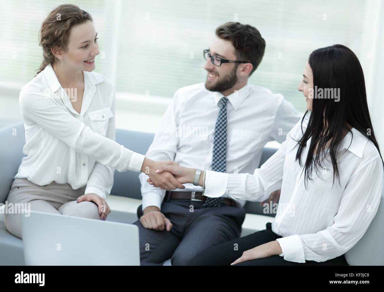 handshake of manager and client in the office lobby Stock Photo - Alamy