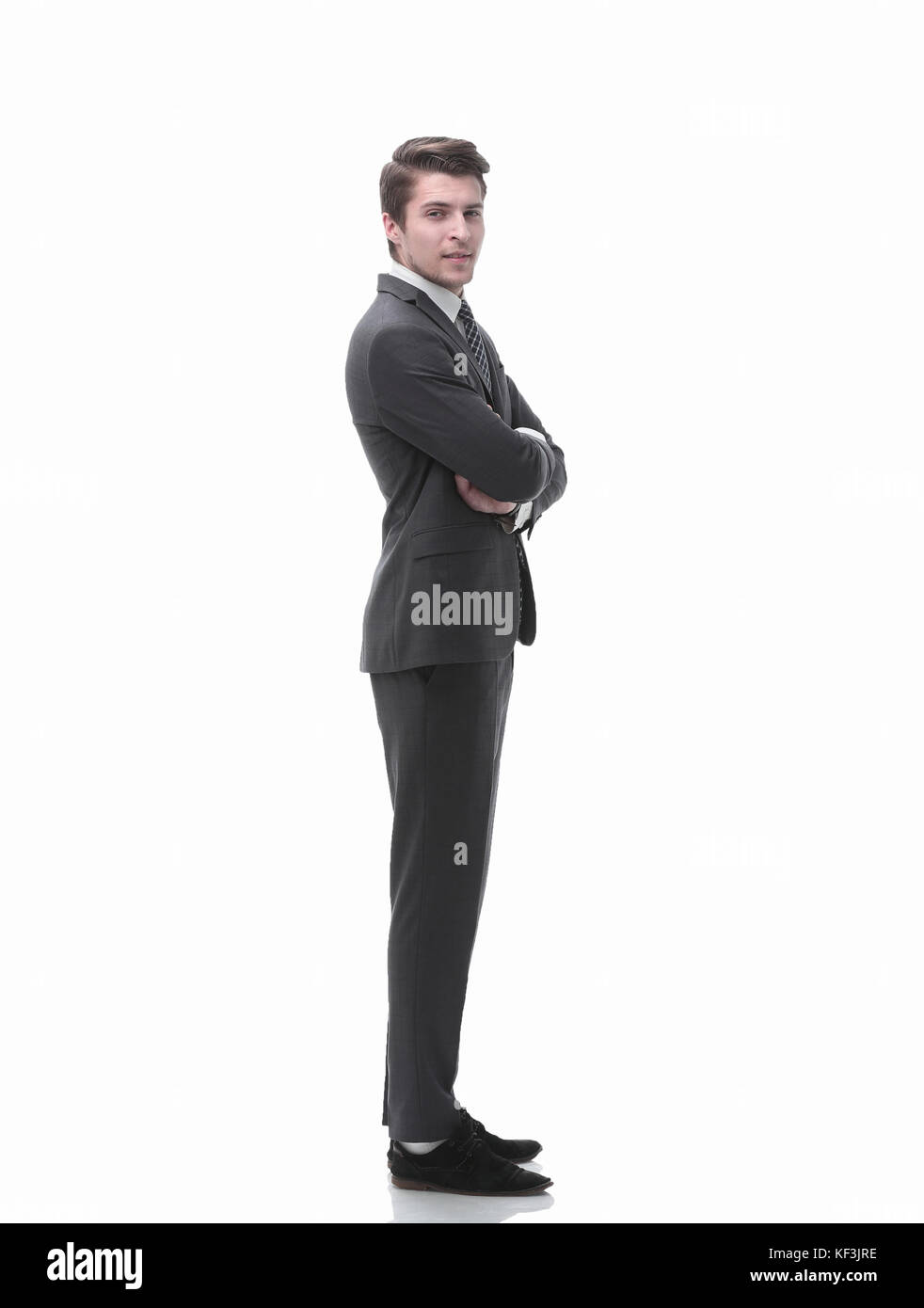 in full growth.confident businessman.side view Stock Photo - Alamy