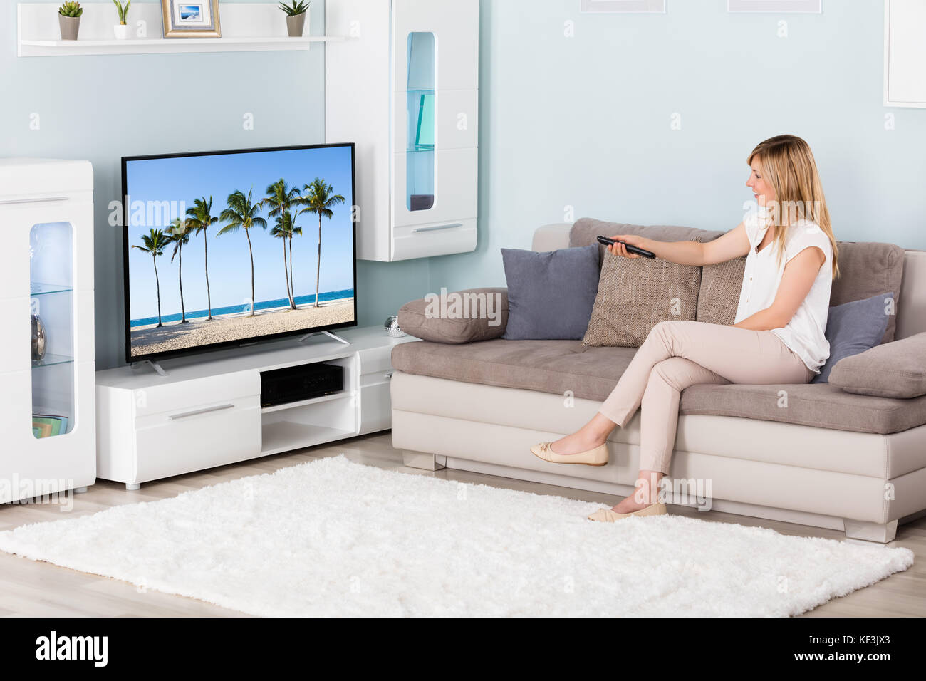 Woman watching movie home hi-res stock photography and images - Alamy