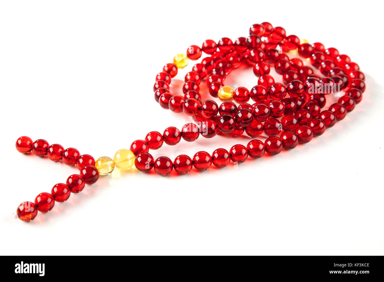 Amber jewelry on white background Stock Photo - Alamy