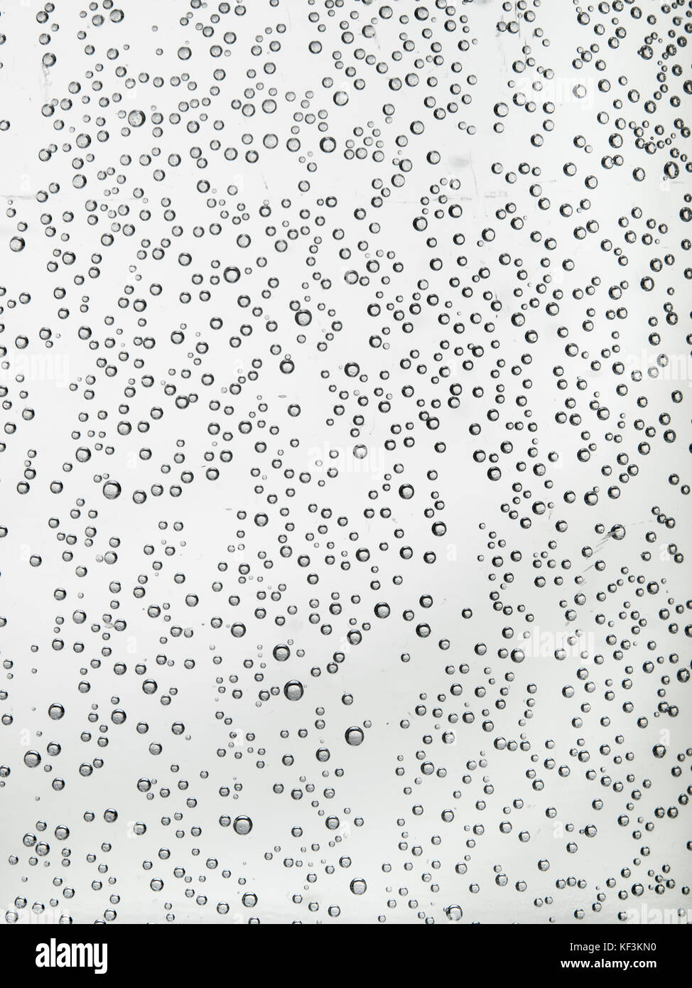 Bubbles in water, rain drops on glass, abstract background Stock Photo ...