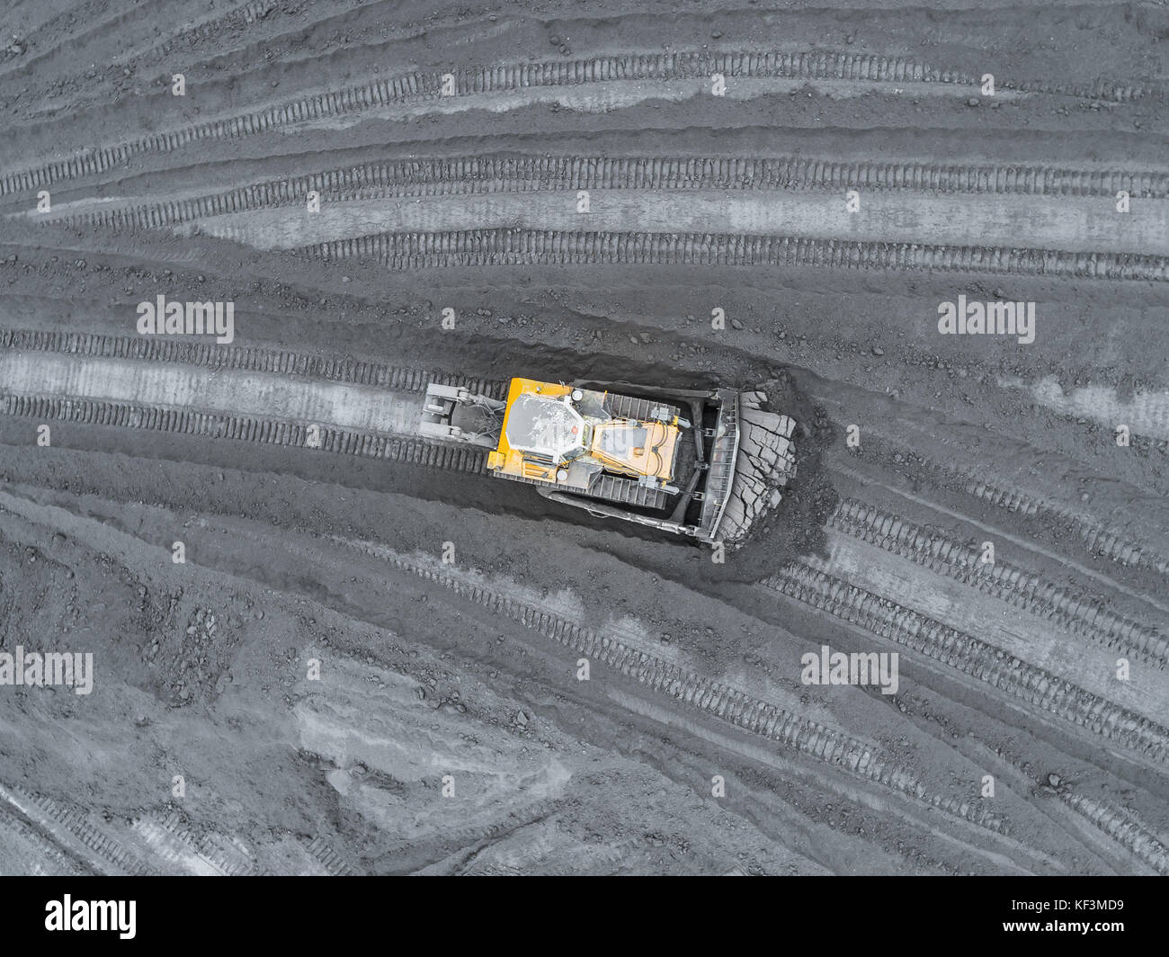 Open pit mine, breed sorting. Mining coal. Bulldozer sorts coal ...