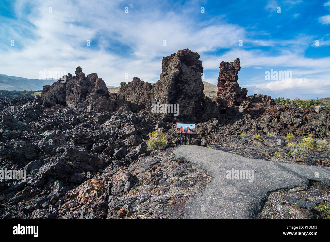 Walkway through cold lava in the Craters of the moon National Park ...