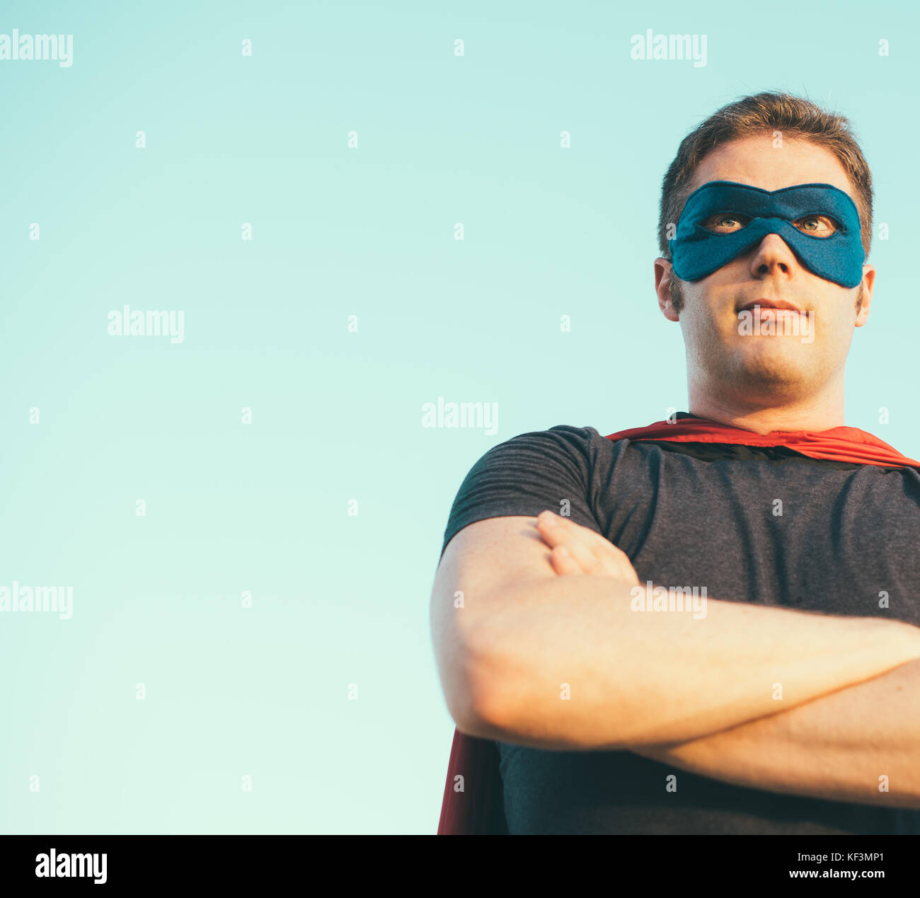 Superhero man against the sky. Place for your text Stock Photo - Alamy