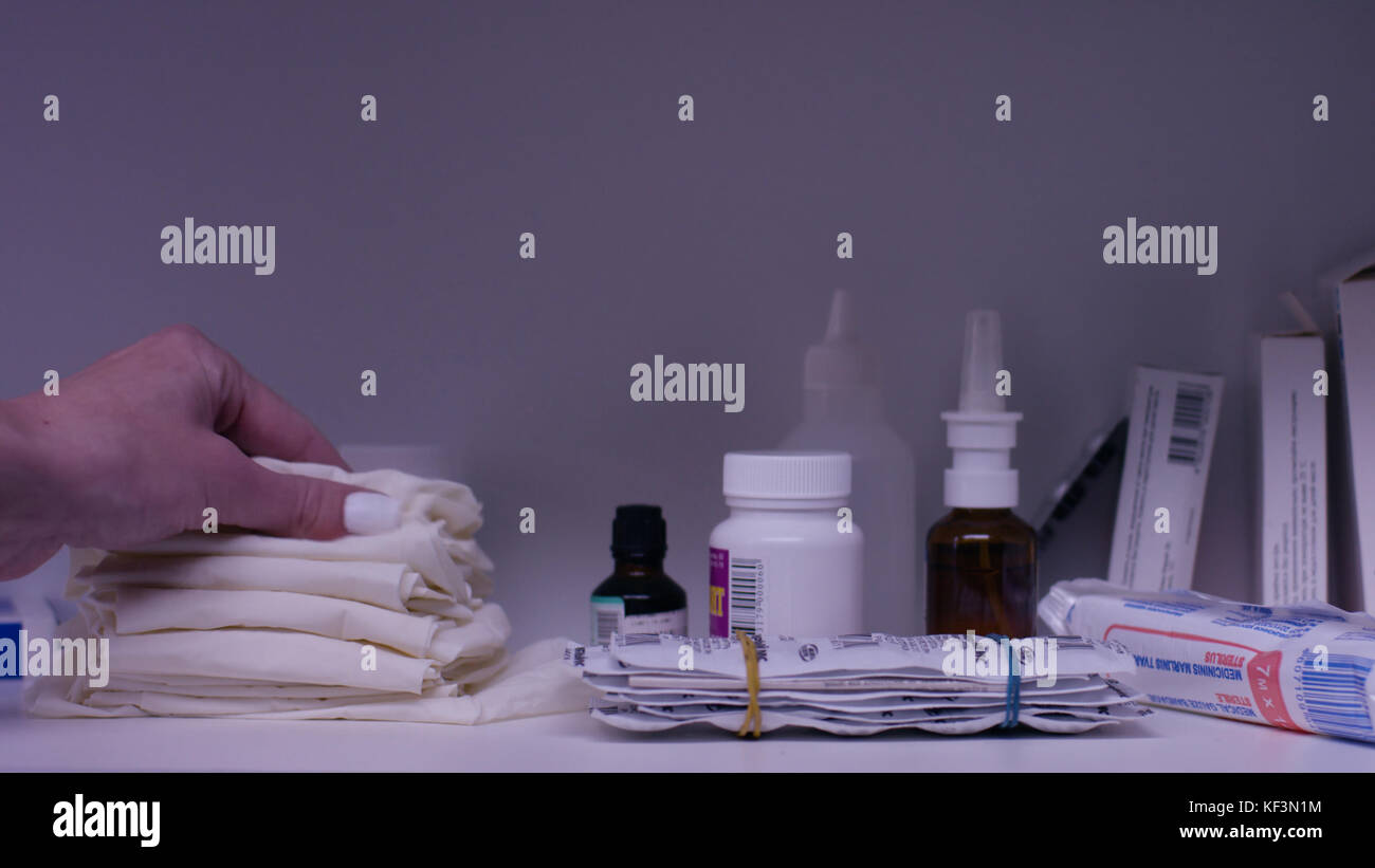 Hand holding otc medicine bottle hi-res stock photography and images ...