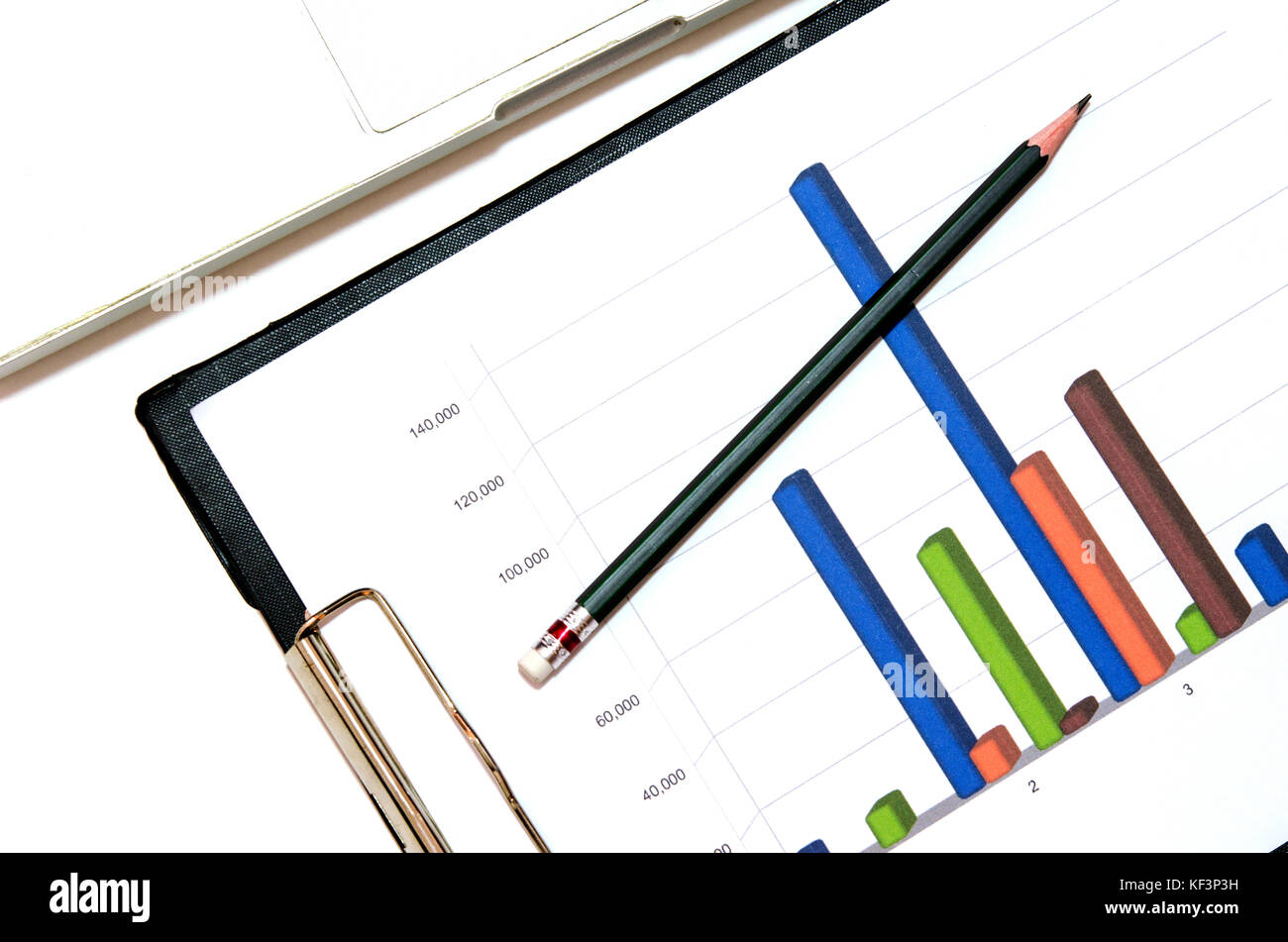 Office desk workplace with charts, and pencil on table. Top view Stock ...