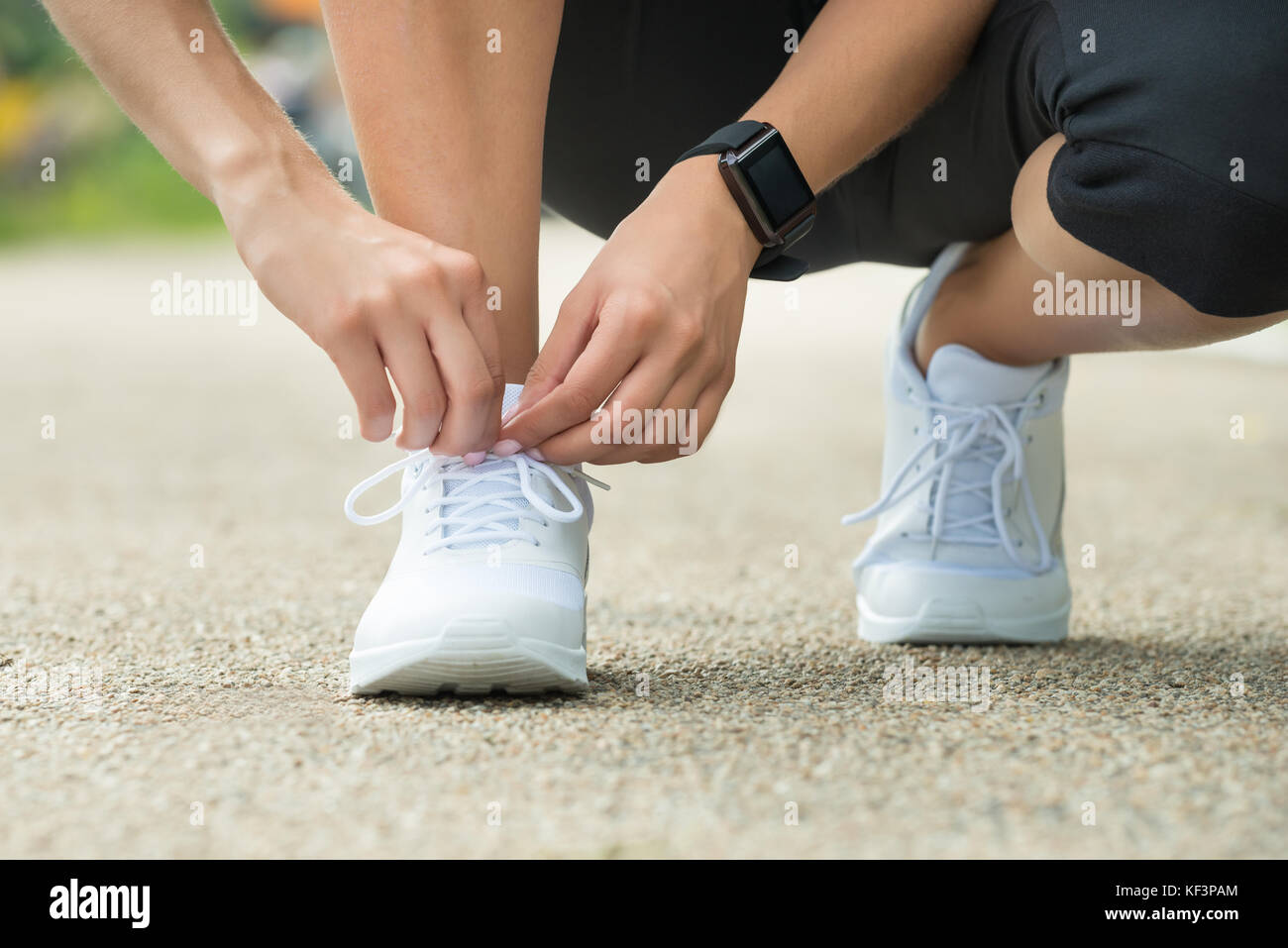 Close-up Of Female Athlete Trying Running Shoes Getting Ready For ...