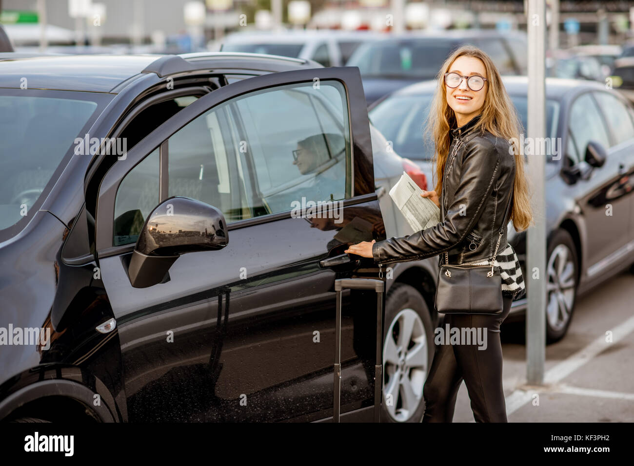 Woman renting a car Stock Photo - Alamy Woman renting a car Stock Photo - Alamy